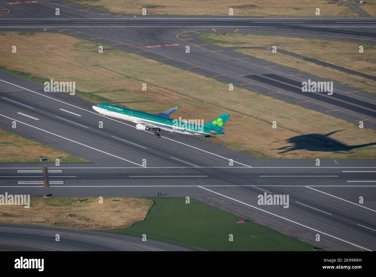 A closeup of an Aer Lingus Airbus 330 plane taking off from Boston on ...