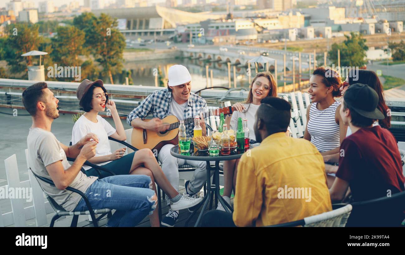 Women dancing playing musical instruments hi-res stock photography and ...