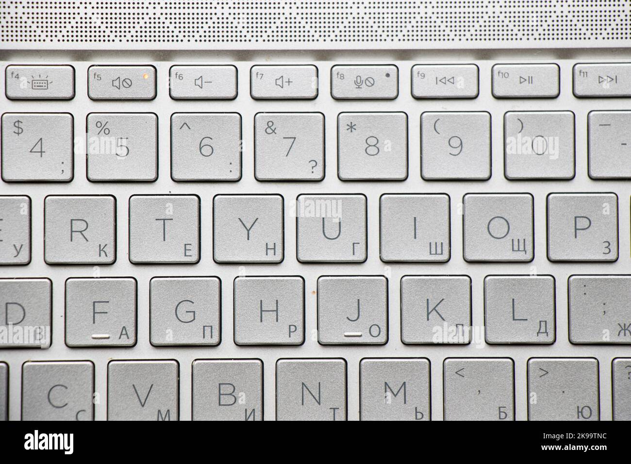 Laptop and notebook computer keyboard close-up, texts, keys and gray ...