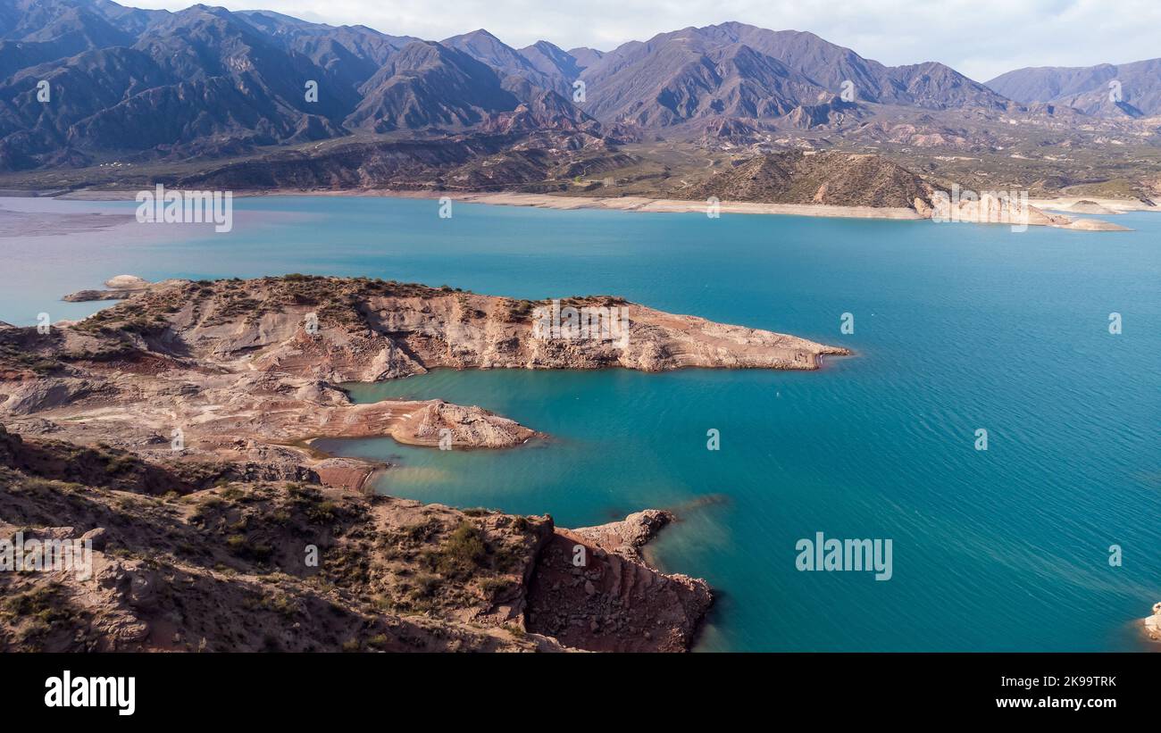 An aerial view of the Lake Potrerillos on a sunny day in Mendoza ...