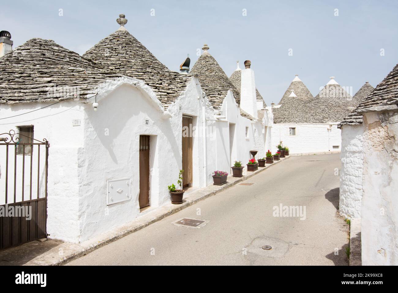 The traditional trulli houses in the town of Alberobello, Puglia, Italy ...