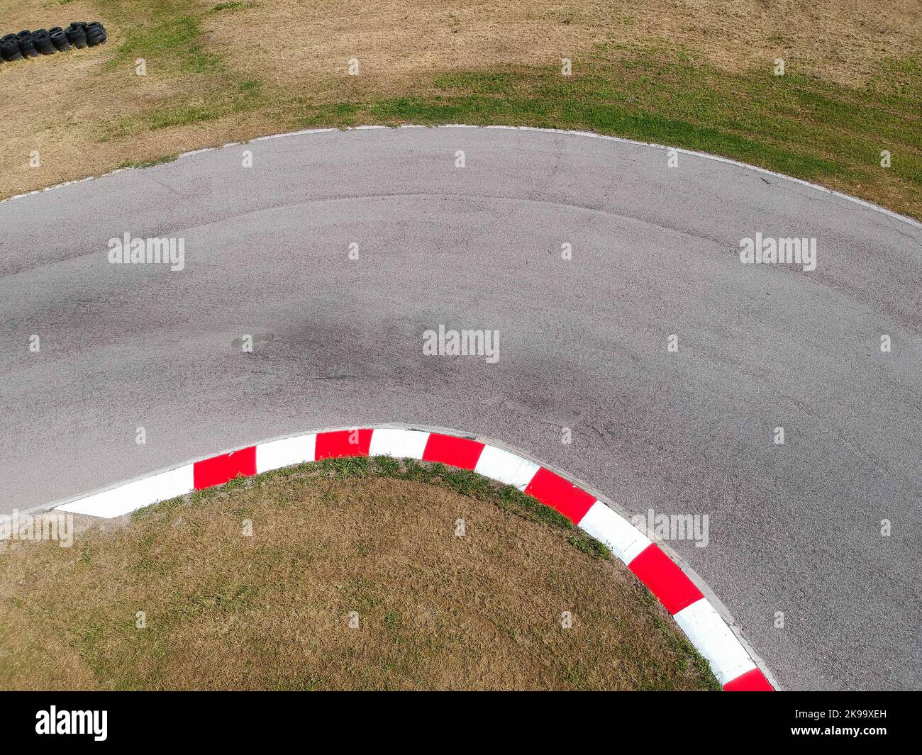 Curves on karting race track, aerial view background Stock Photo - Alamy