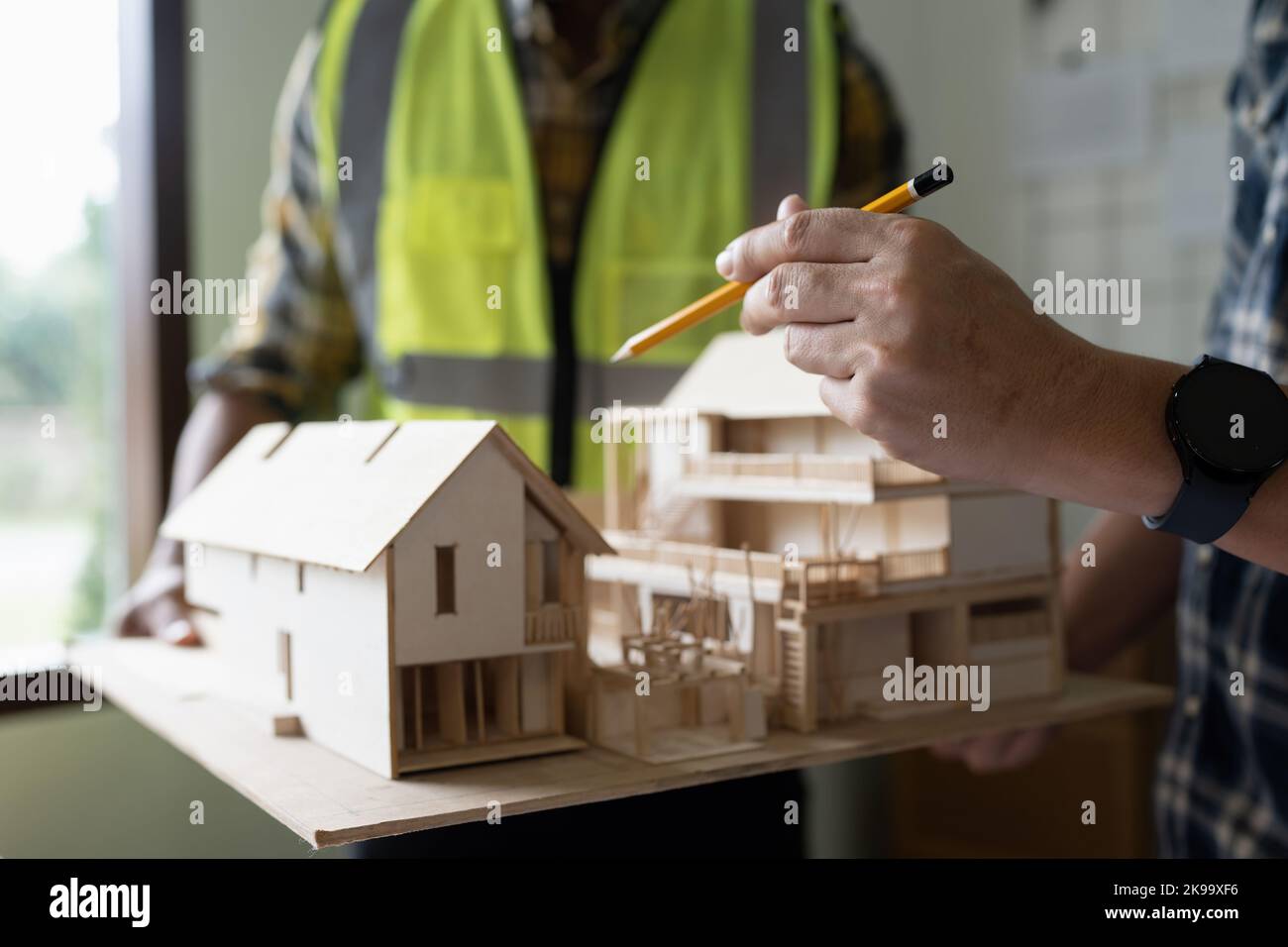 Architect man working with blueprints for architectural plan, engineer ...