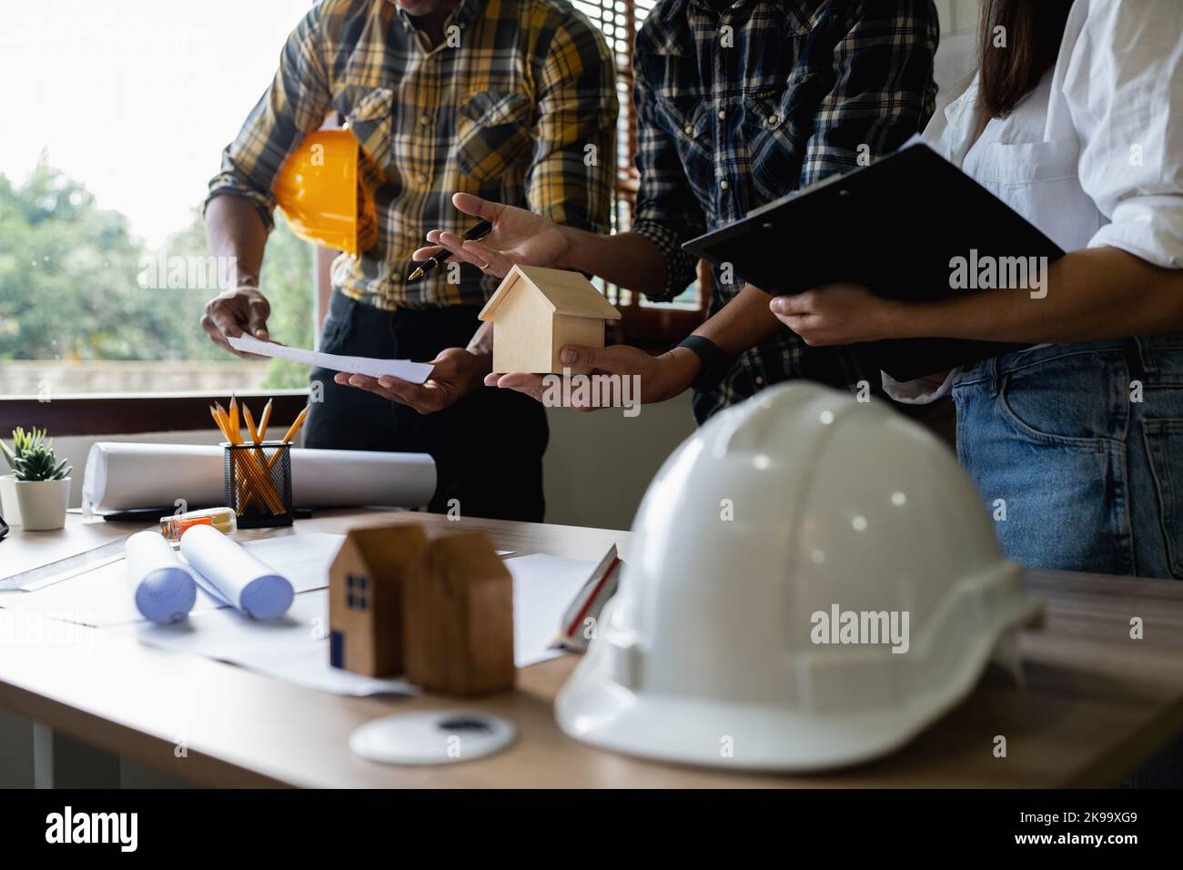Architect man working with blueprints for architectural plan, engineer ...