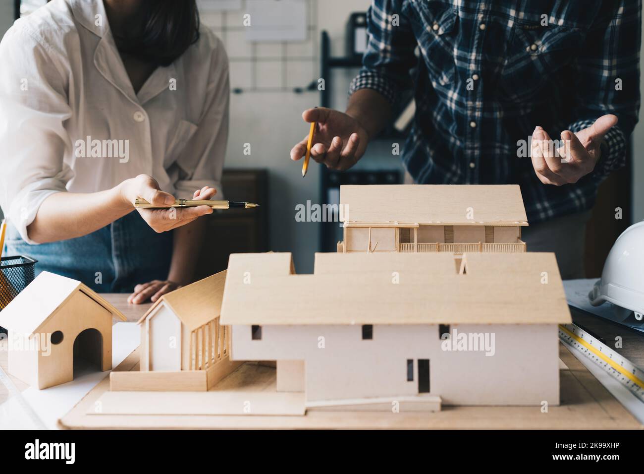 Architect man working with blueprints for architectural plan, engineer ...