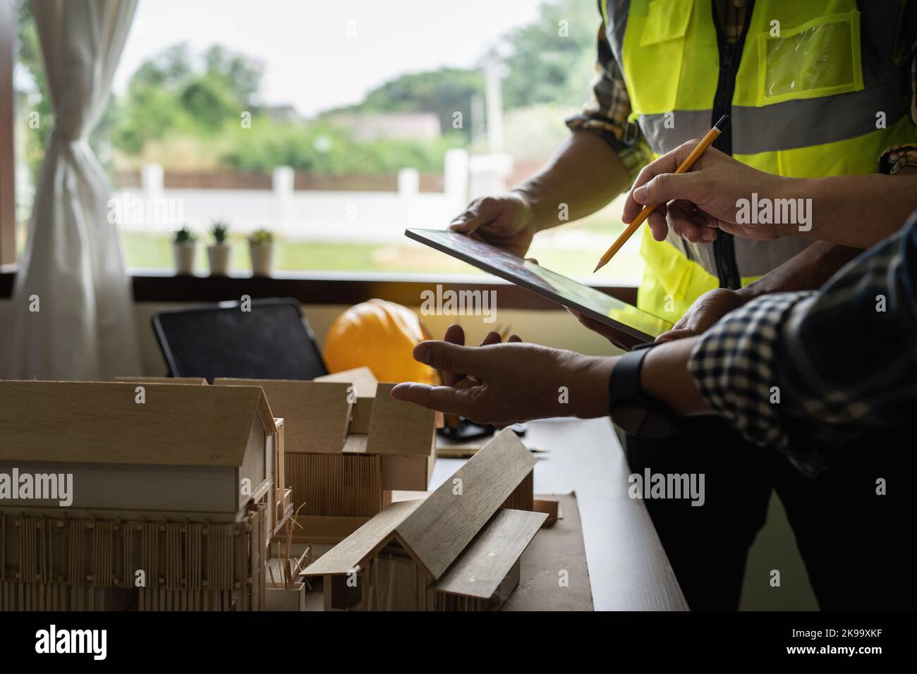 Architect man working with blueprints for architectural plan, engineer ...