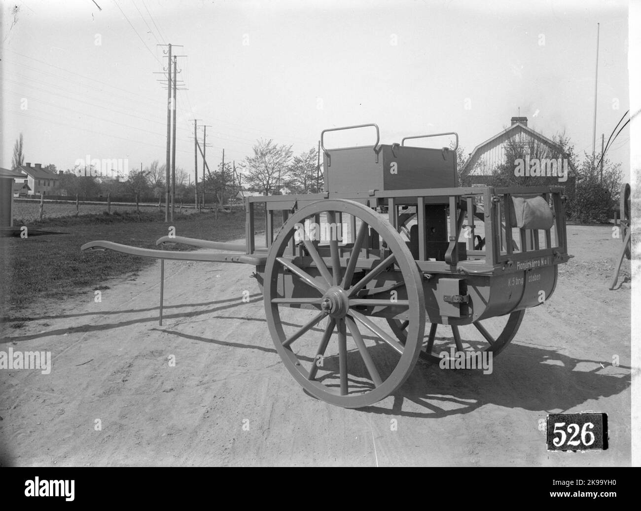 Pioneer cart in front of the station house Stock Photo - Alamy