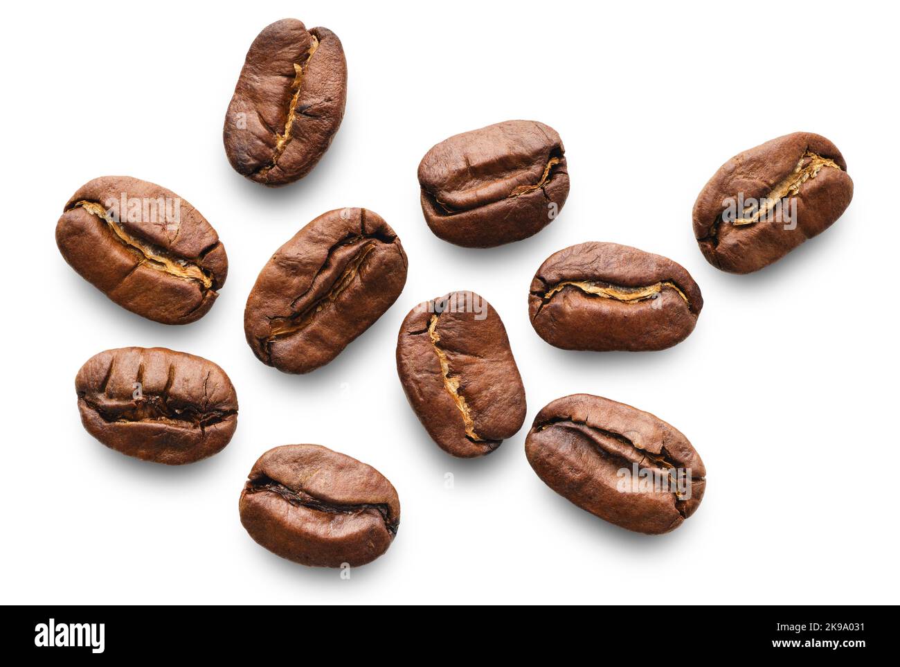 Group of roasted arabica coffee beans, isolated on white background ...