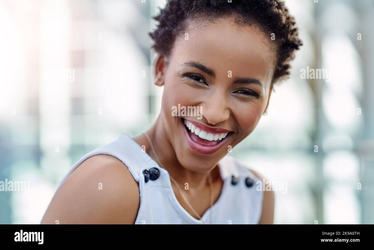 Smiling is what you do when your hard work pays off. Cropped portrait ...