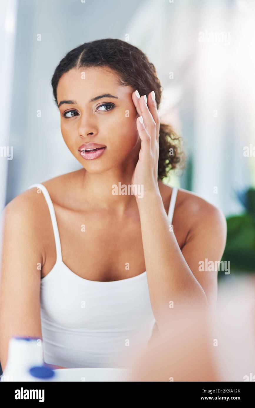 I Cant Believe The Results An Attractive Young Woman Touching Her Face
