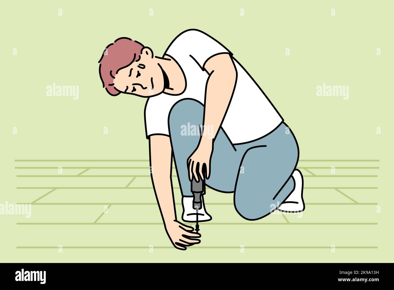 Young man with screwdriver repairing floor indoors. Exhausted male put ...