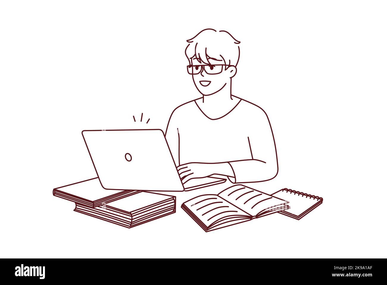 Smart young man sit on table work on laptop with textbooks. Smiling ...