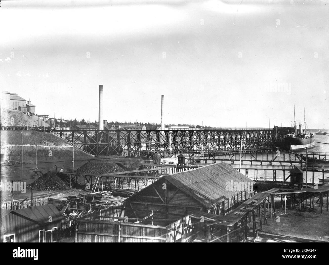 Ore loading bridges in the first development stage. Svartön Stock Photo ...