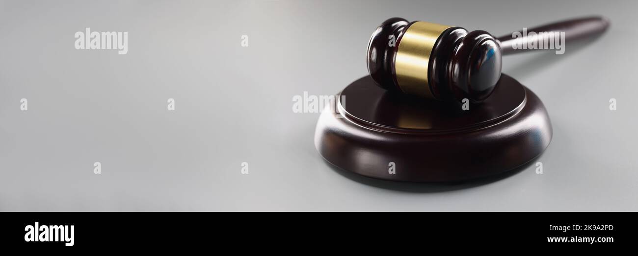 Brown judge wooden hammer on soundboard, attorney instrument for legal ...