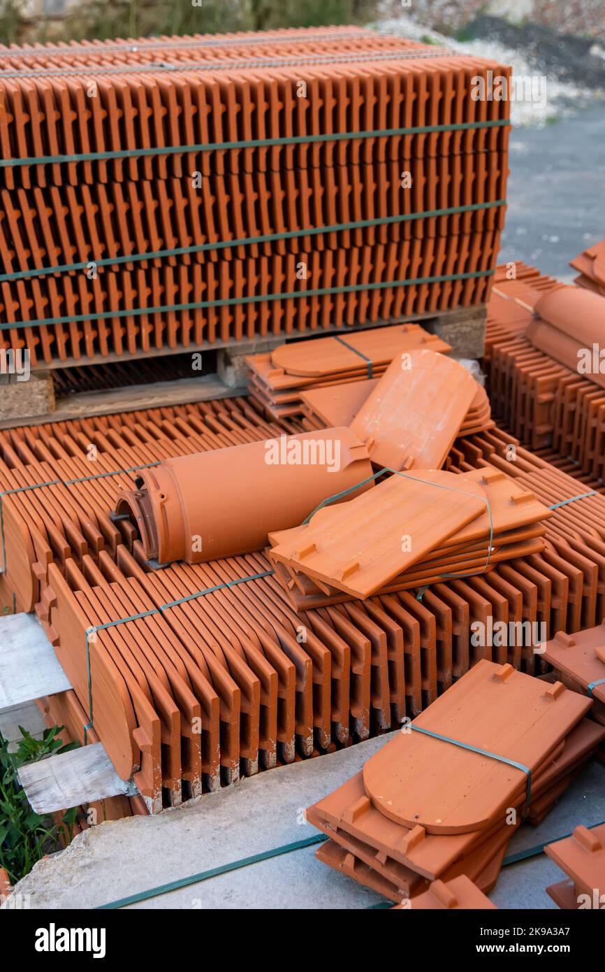 Stack new roof tiles hi-res stock photography and images - Alamy