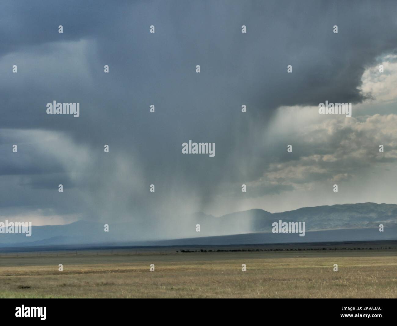 Dramatic sky after a rain storm in Kyrgyzstan Stock Photo - Alamy