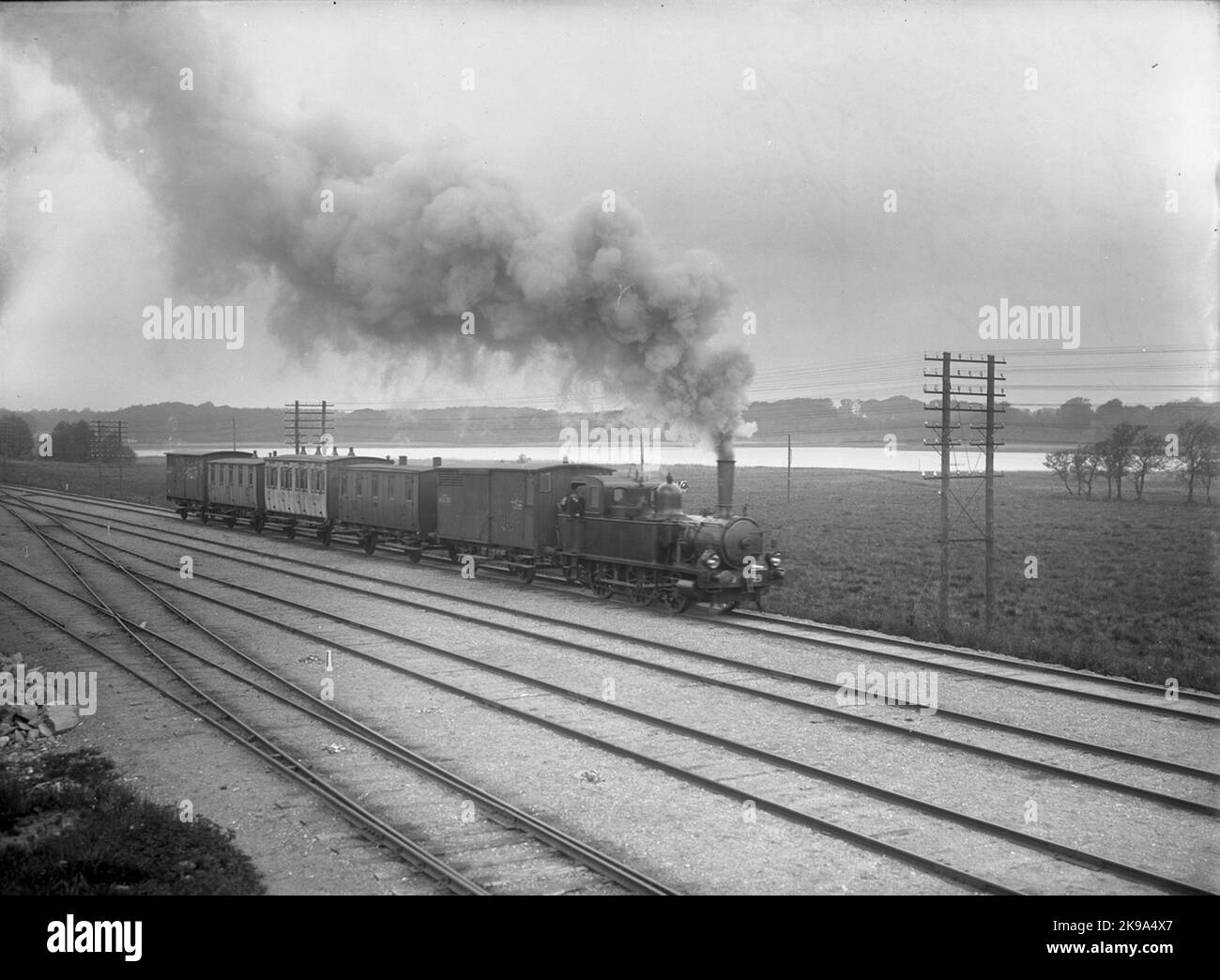 Myj Lok 29. Steam locomotive with old passenger cars. The locomotive ...