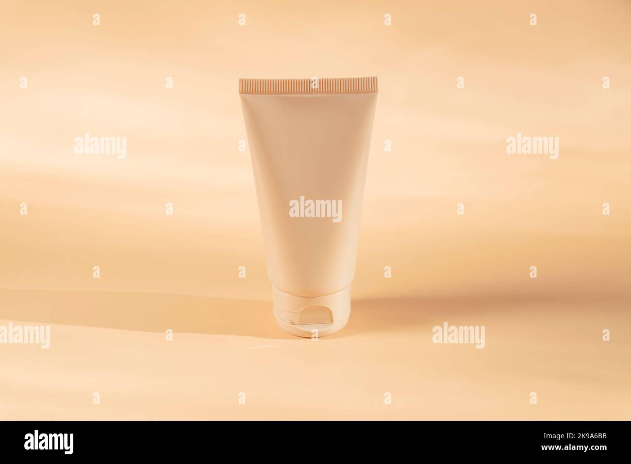 Blank beige pastel packaging tube for beauty spa, medical skincare and ...