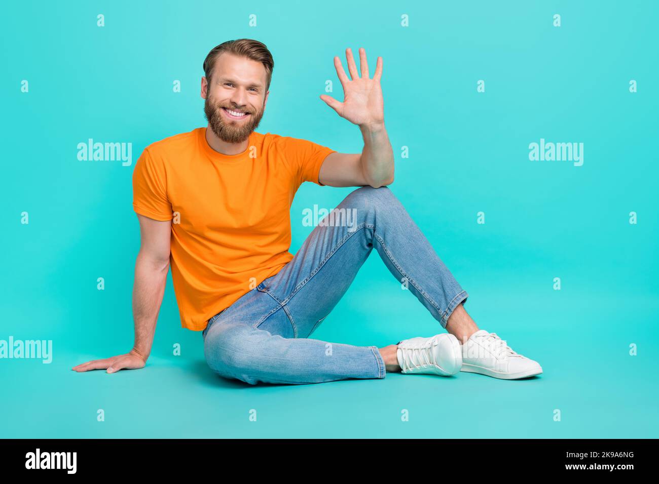 Full size photo of good mood optimistic man dressed orange t-shirt ...