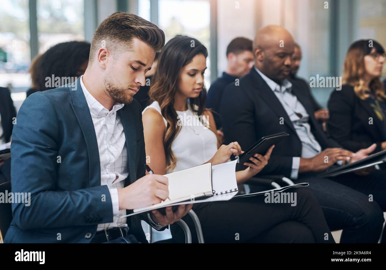 Im going to remember that. a group of businesspeople sitting in the ...