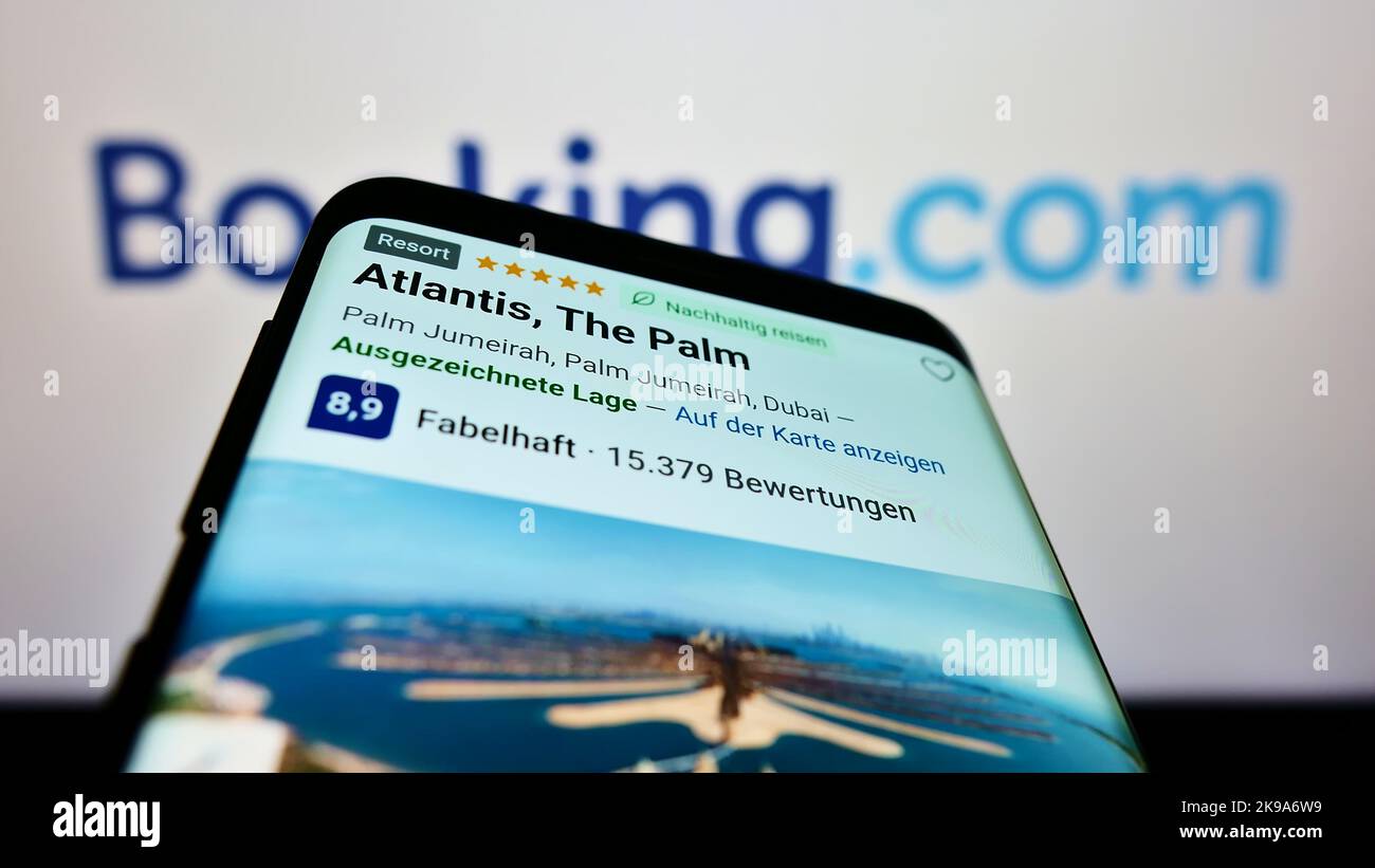 Mobile phone with website of Dutch online travel agency Booking.com on ...