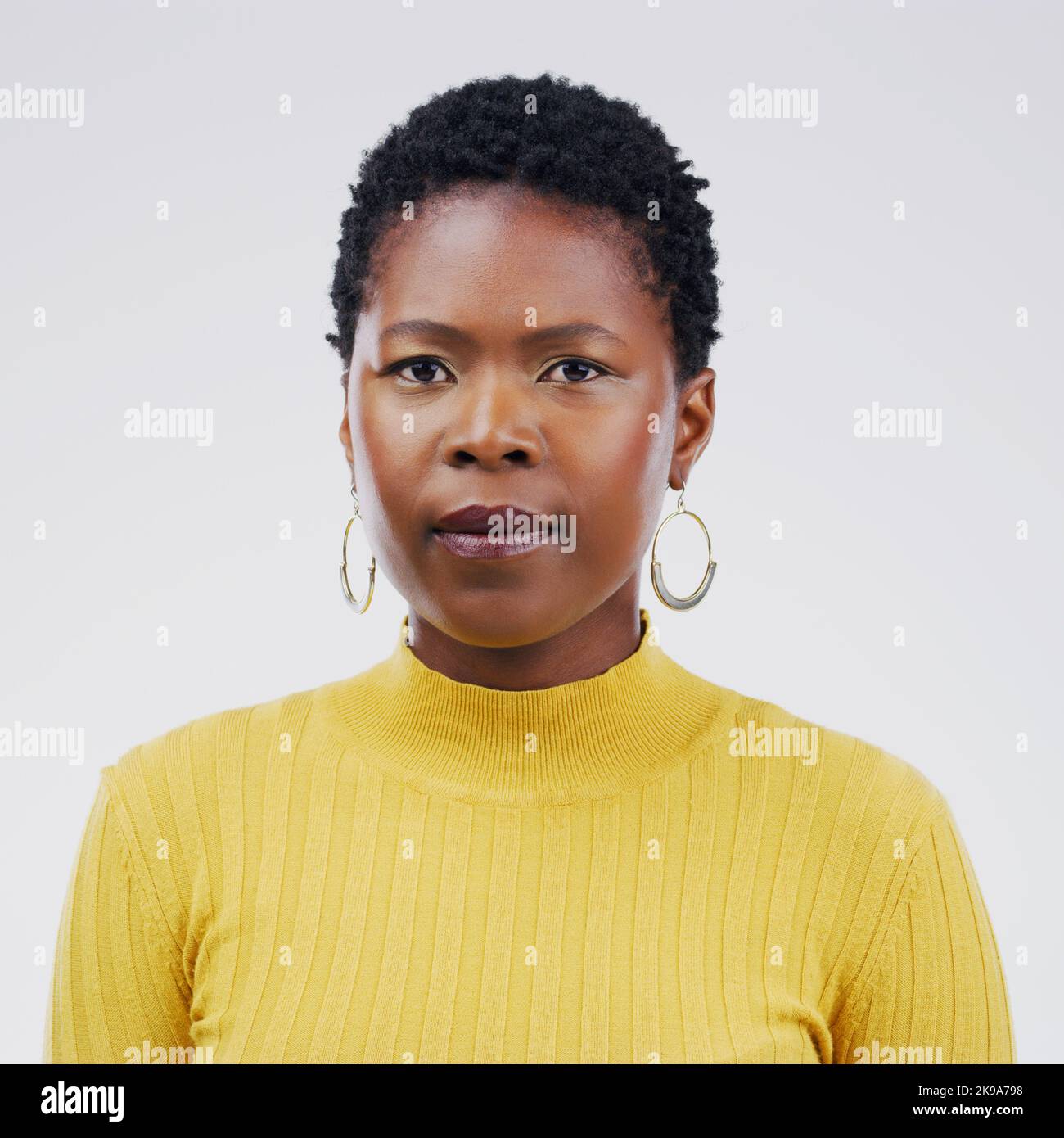 I keep my emotions in check. Studio portrait of an attractive young ...