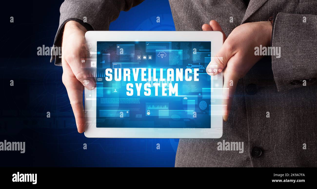 Person holding tablet, security concept Stock Photo - Alamy
