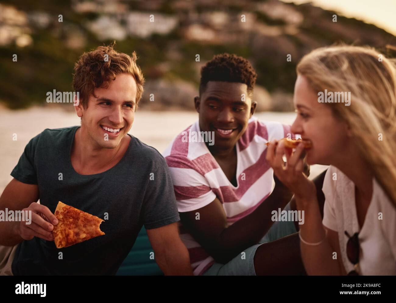 Nothing goes better together than pizza and friends. a group of friends ...