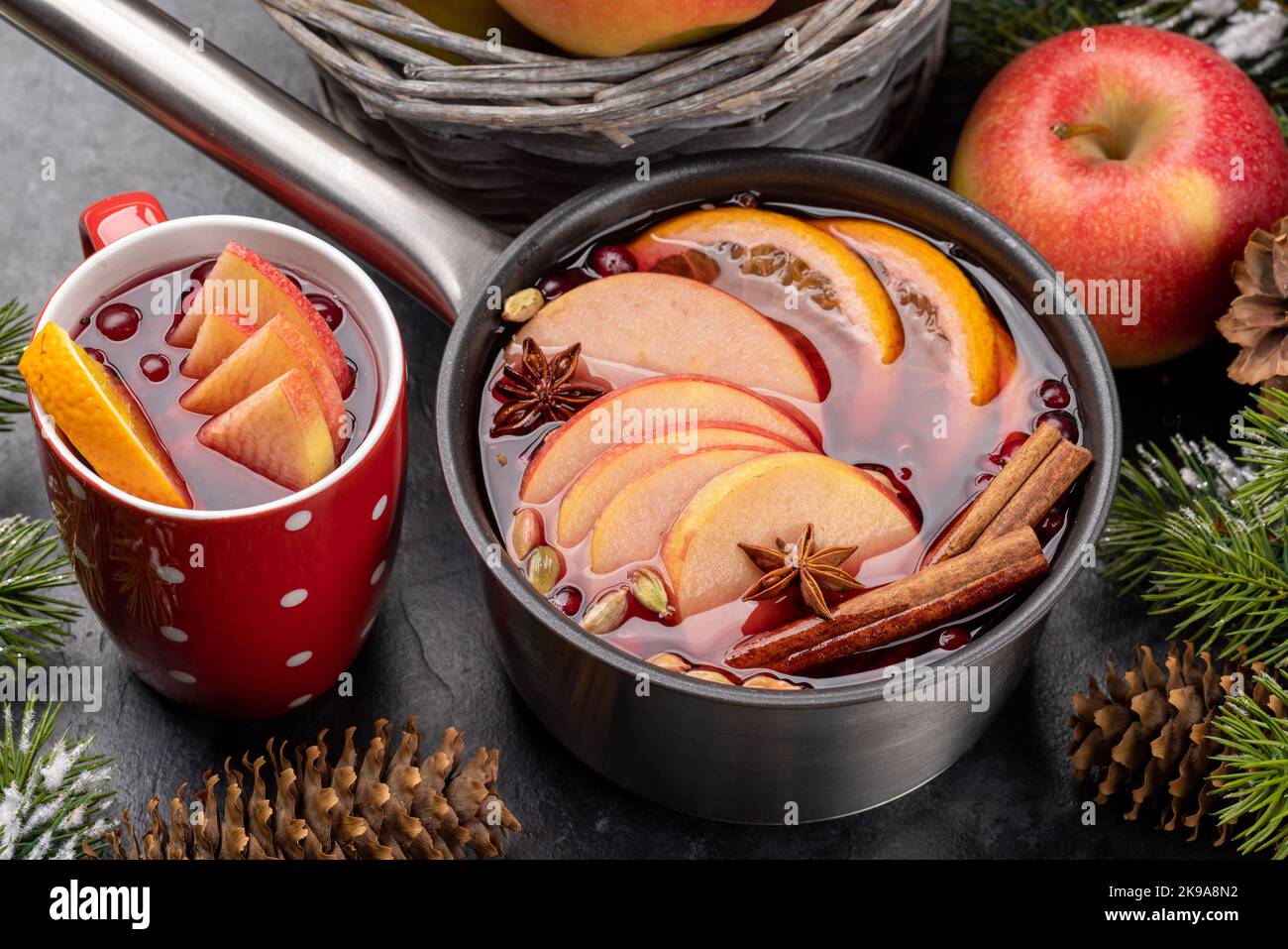 Hot mulled wine with fruits and spices Stock Photo - Alamy