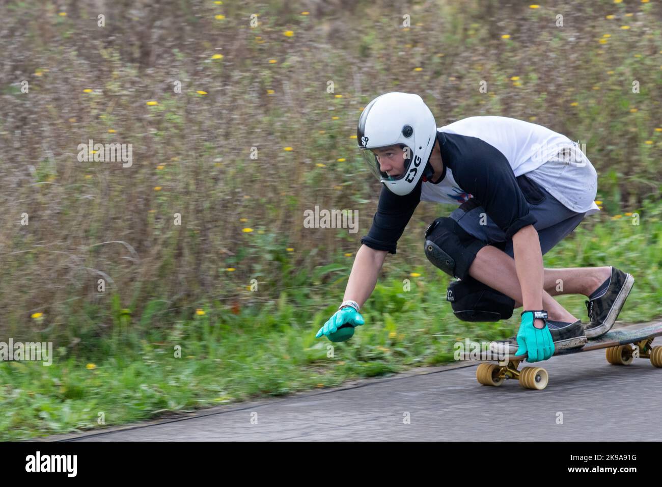 Skateboarder turning right on the Redbridge Cycling Centre track during ...