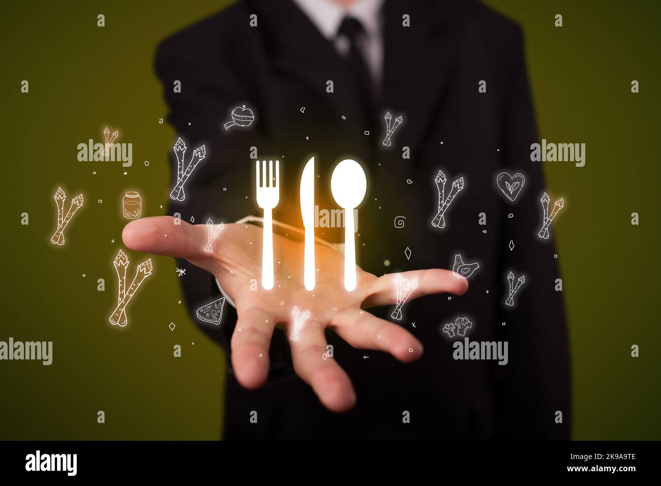 Hand holding food related icons Stock Photo - Alamy