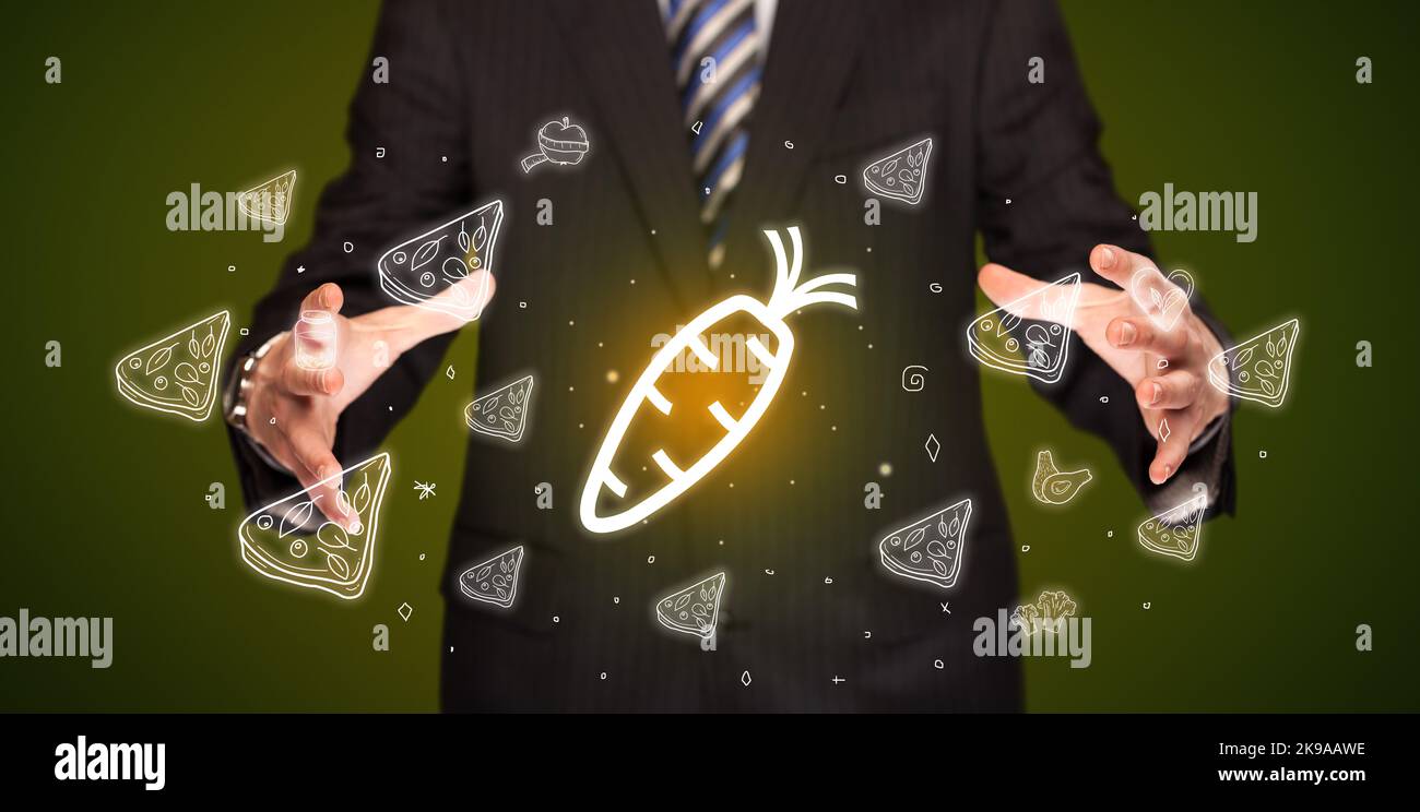 Hand holding food related icons Stock Photo - Alamy