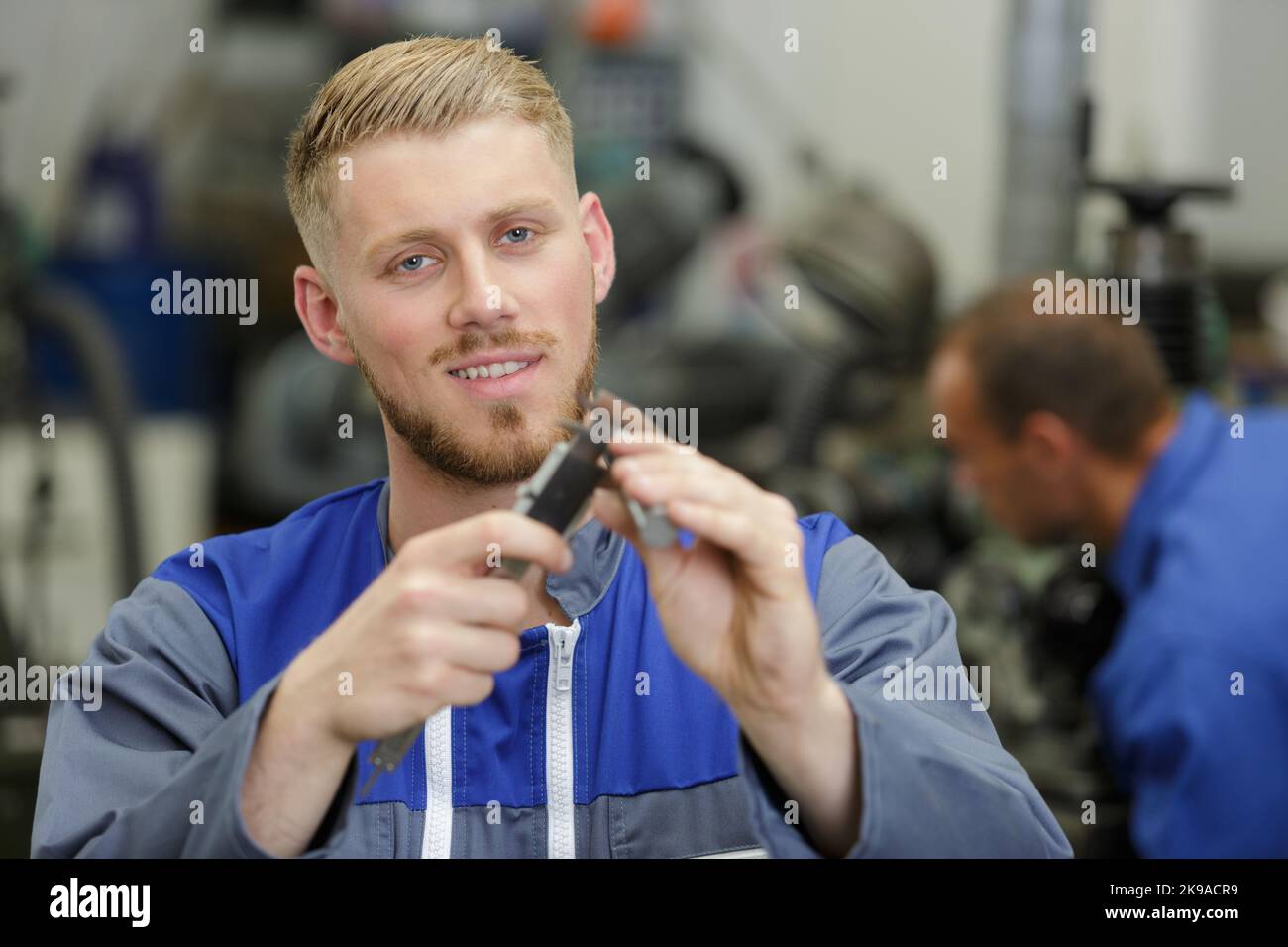 a carpenter with a piece Stock Photo - Alamy