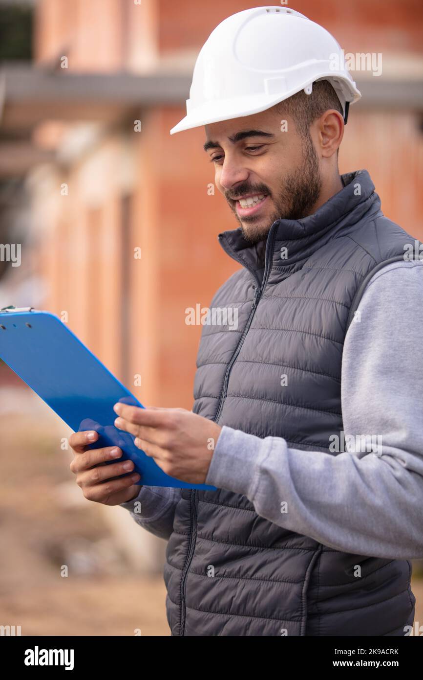 inspector is checking and inspecting the building Stock Photo - Alamy