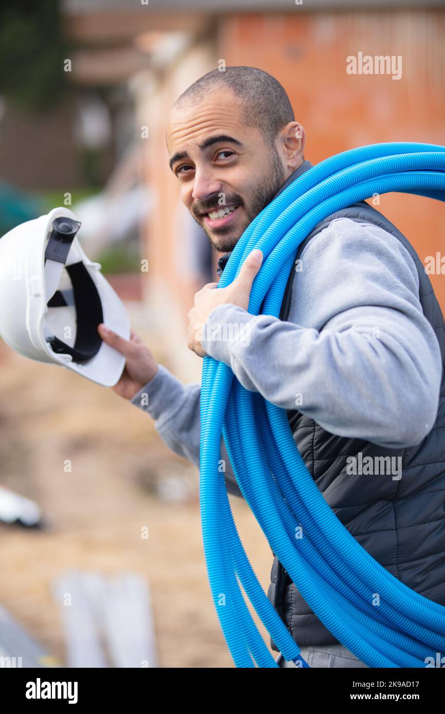 Carrying wires hi-res stock photography and images - Alamy