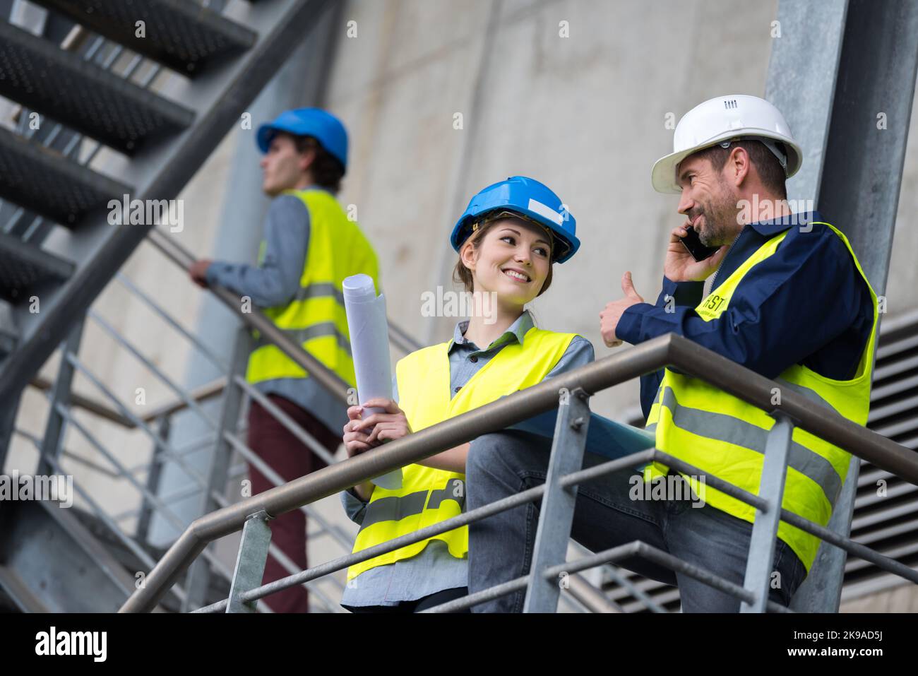 civil engineers talking about project Stock Photo - Alamy