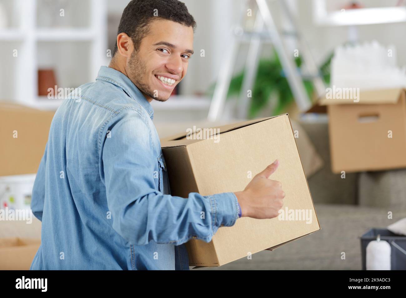 Carrying out packages hi-res stock photography and images - Alamy