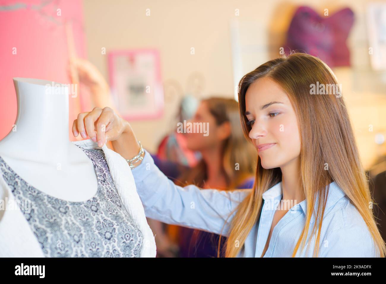 Customer dress touching hi-res stock photography and images - Alamy