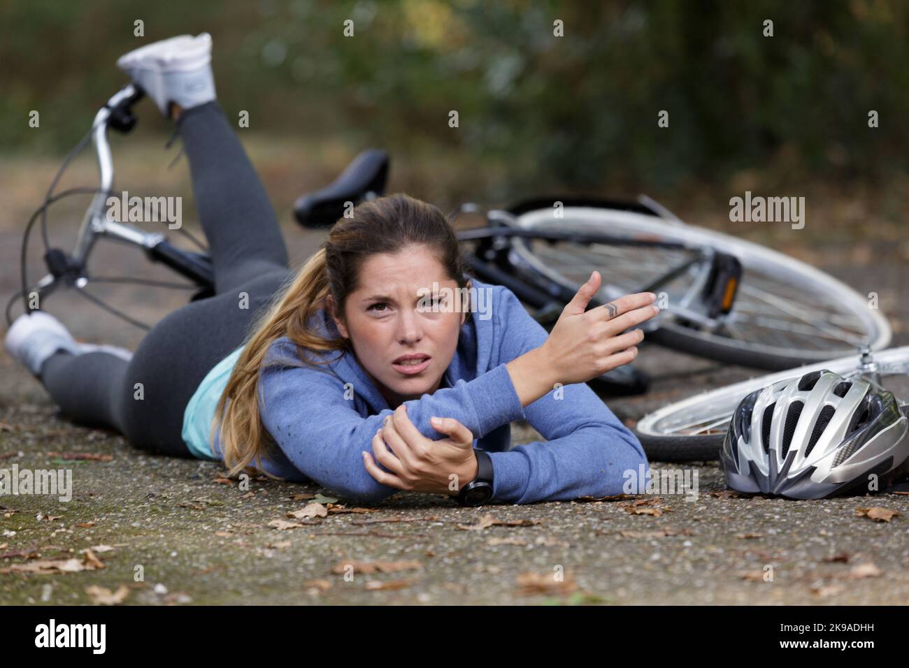 woman fell off the bike Stock Photo - Alamy
