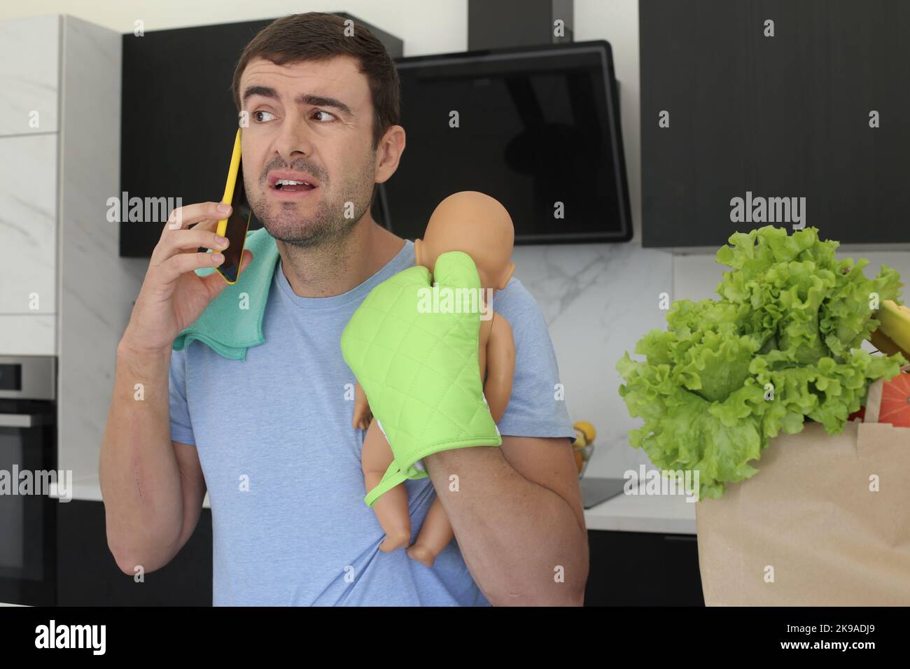 Stressed out parent multitasking at home Stock Photo - Alamy