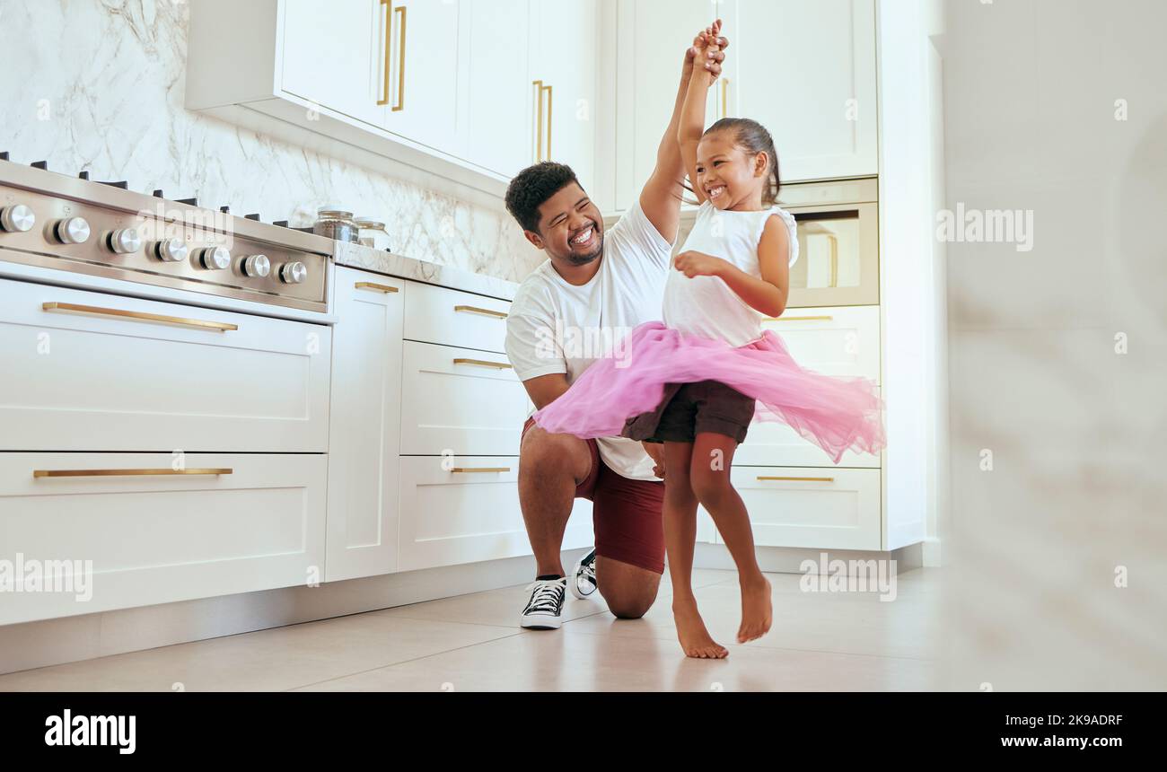 Dad, girl and ballet dance of a child in a home kitchen dancing ...