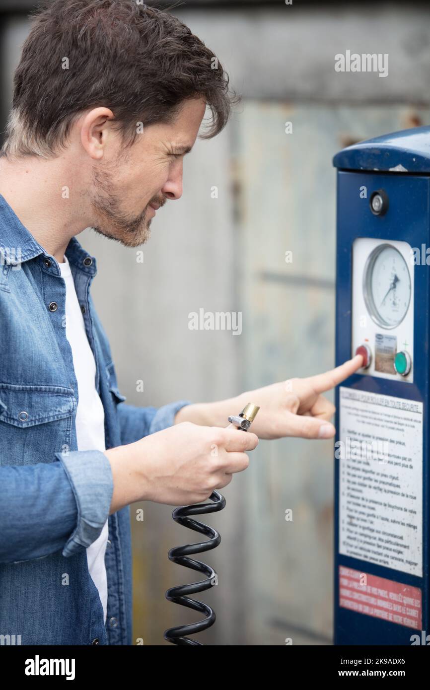check holding pressure gauge for car tyre pressure measurement Stock ...