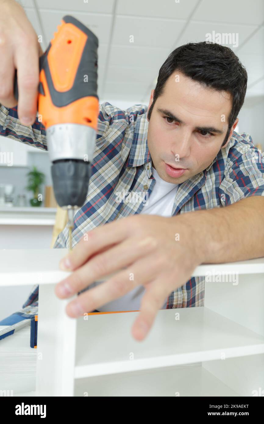 Installing shelves hi-res stock photography and images - Alamy