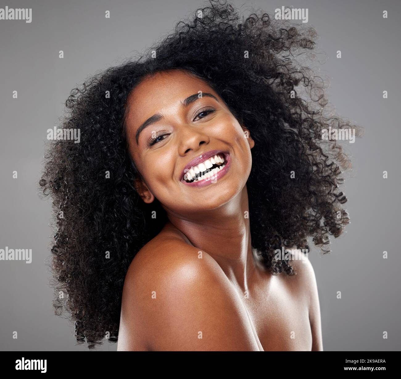 Black woman, smile and hair for face, makeup and happy with beauty ...