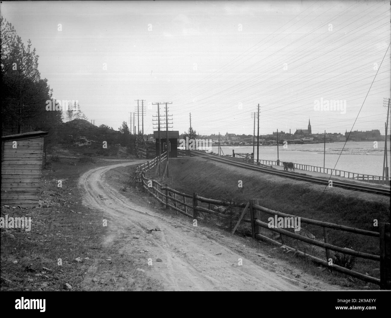 Road crossing with gates Stock Photo - Alamy