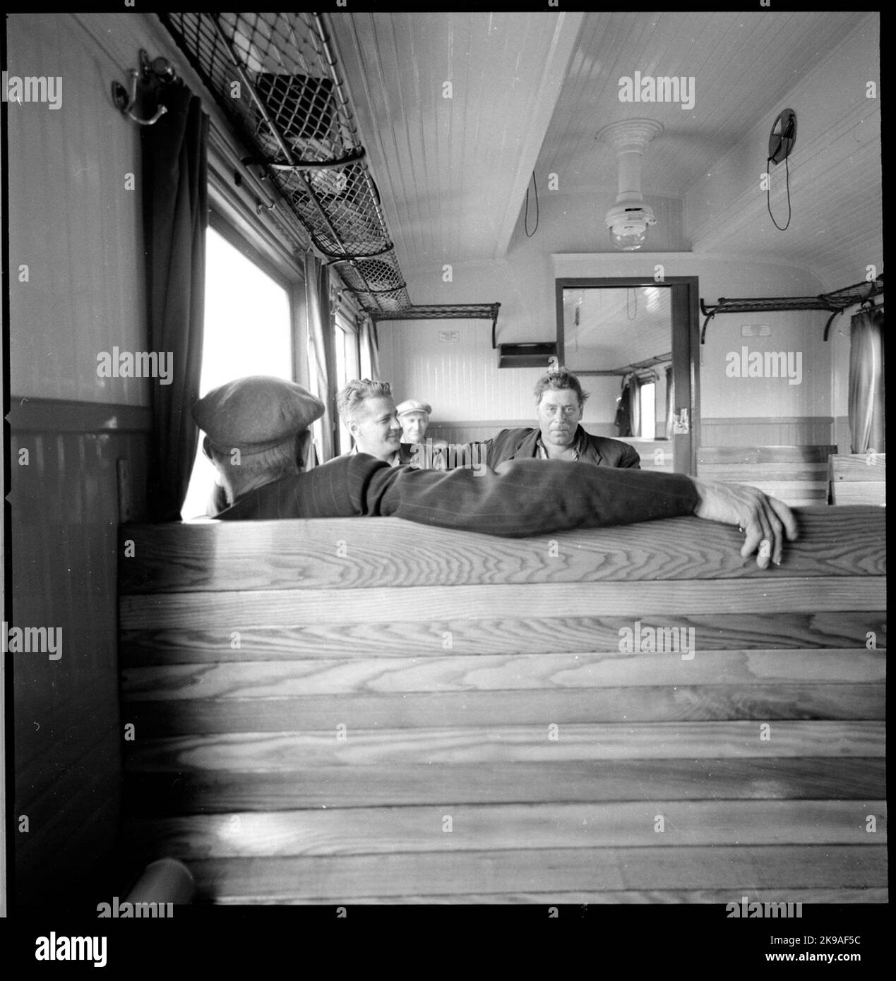 Train travelers in, State Railways, SJ freight wagon, 3rd grade Stock ...