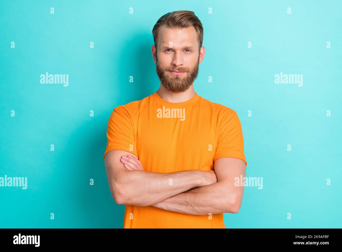 Portrait of focused young person folded arms look camera isolated on ...