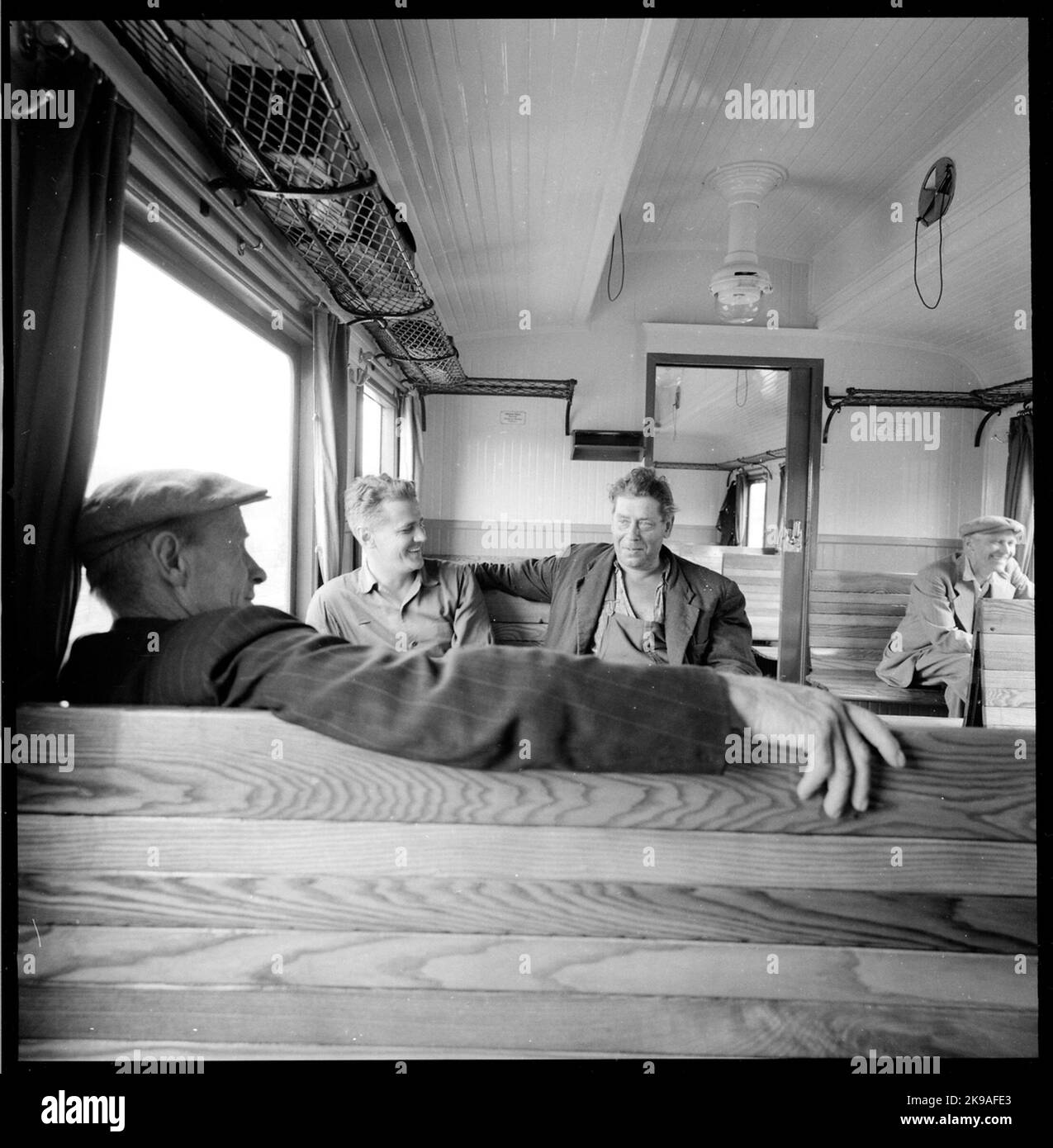 Train travelers in, State Railways, SJ freight wagon, 3rd grade Stock ...
