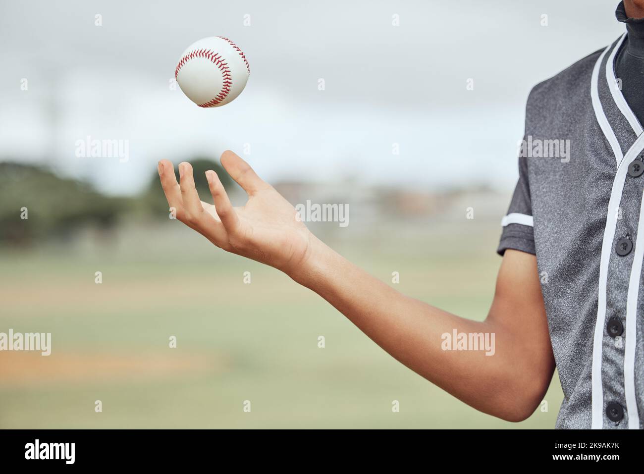 Hand holding softball hi-res stock photography and images - Alamy