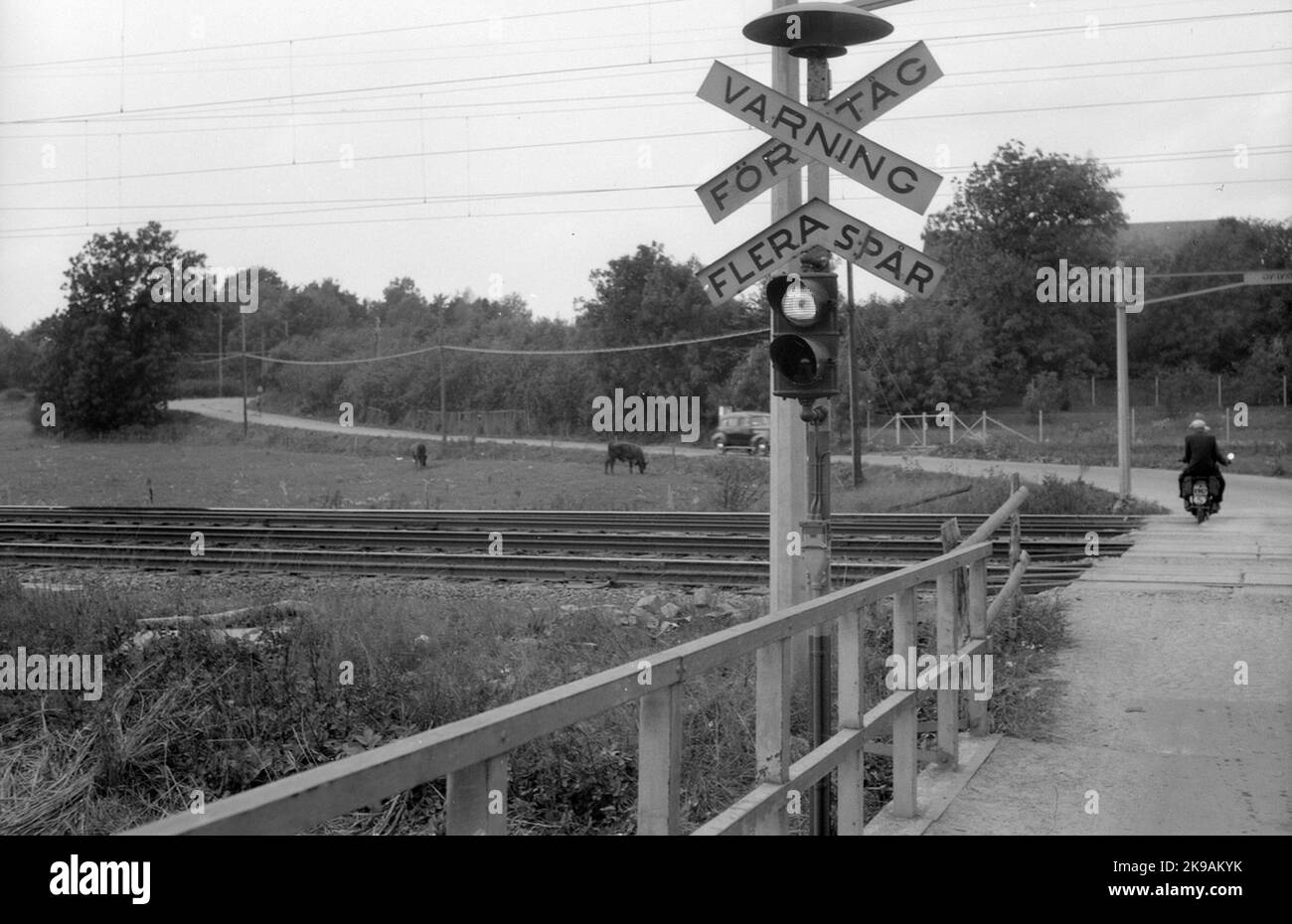 Train tracks warning rail Black and White Stock Photos & Images - Alamy